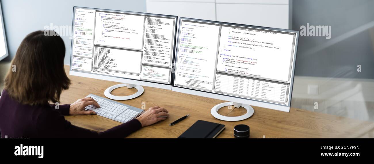 Software Programmer Or Coder Woman Using Office Computer Stock Photo ...