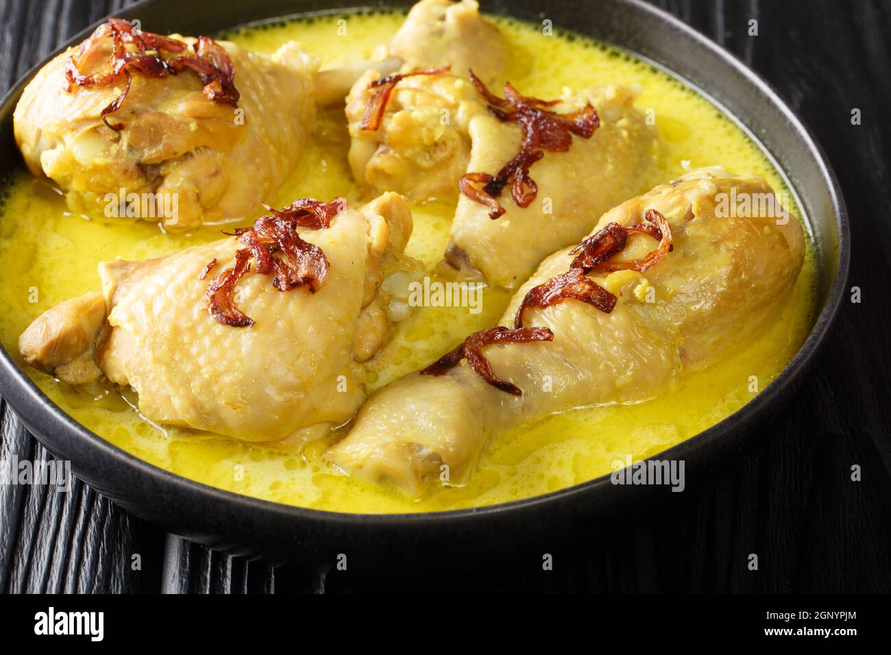 Opor ayam chicken cooked in coconut milk is one of many Indonesian ...