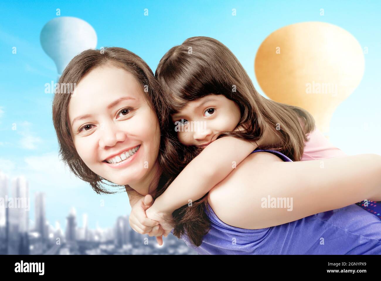 Asian mother carrying her little girl on her back with colorful air ... Asian mother carrying her little girl on her back with colorful air ...