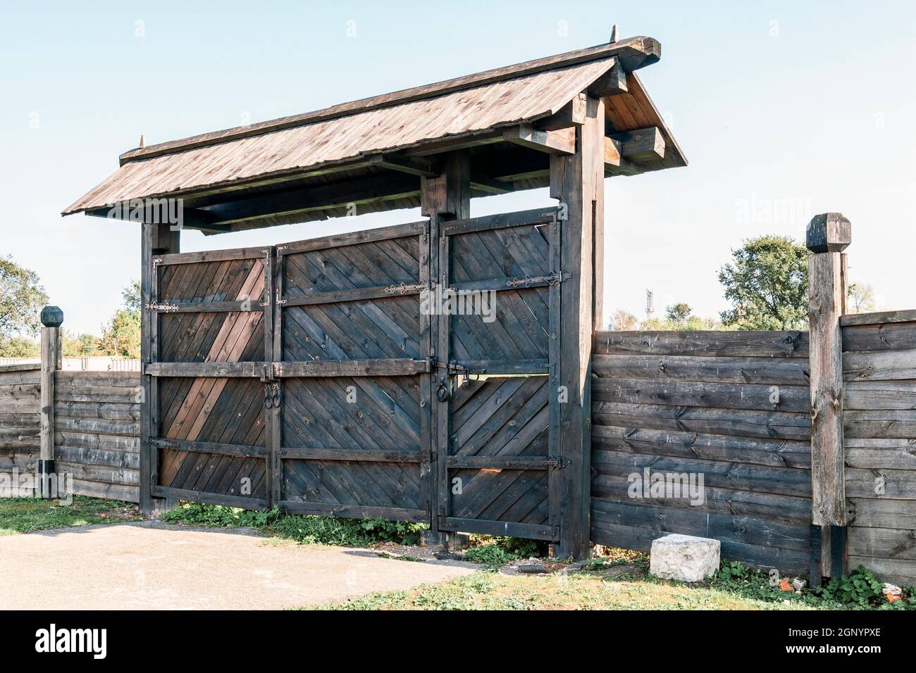 Old historic wooden gates with elaborate metal hinges Stock Photo - Alamy