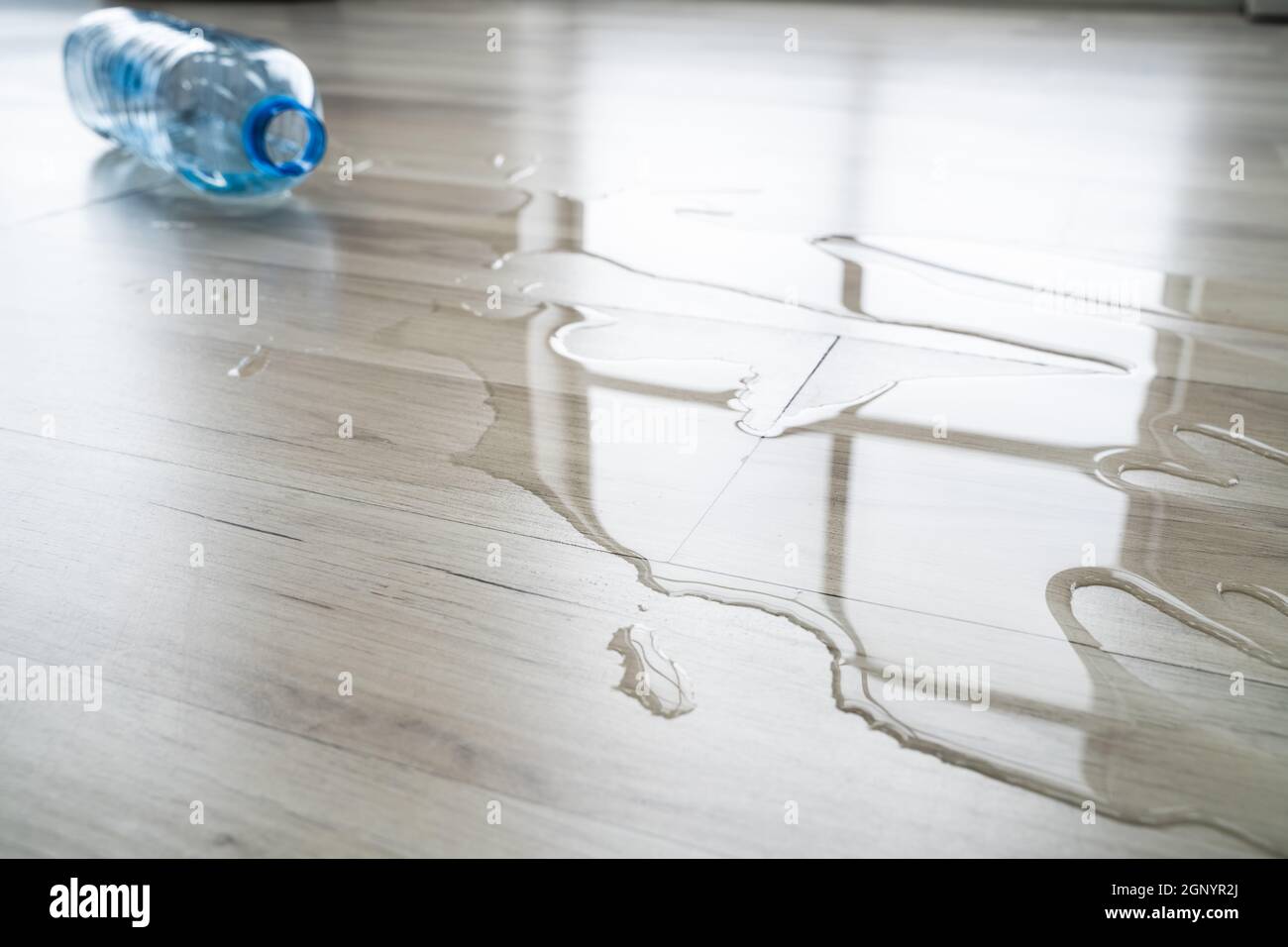 Water On House Floor Surface. Laminate Damage Stock Photo - Alamy