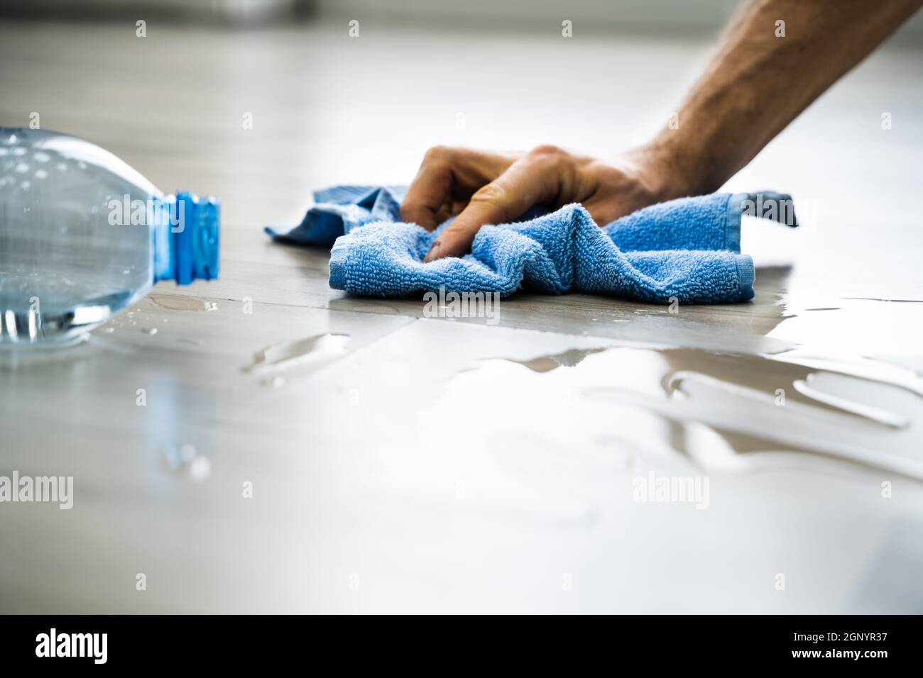 Hand Cleaning Water On House Floor Surface. Laminate Damage Stock Photo ...