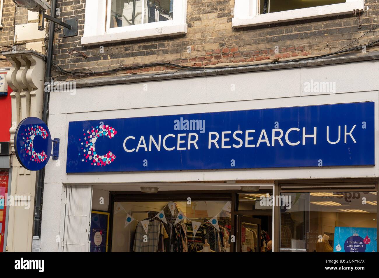 Cancer Research UK logo in london Street Norwich Stock Photo - Alamy