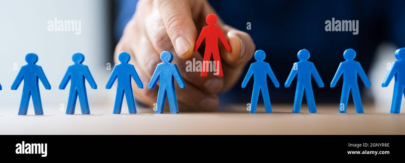 Staffing Candidate Selection Interview By Hand At Desk Stock Photo - Alamy