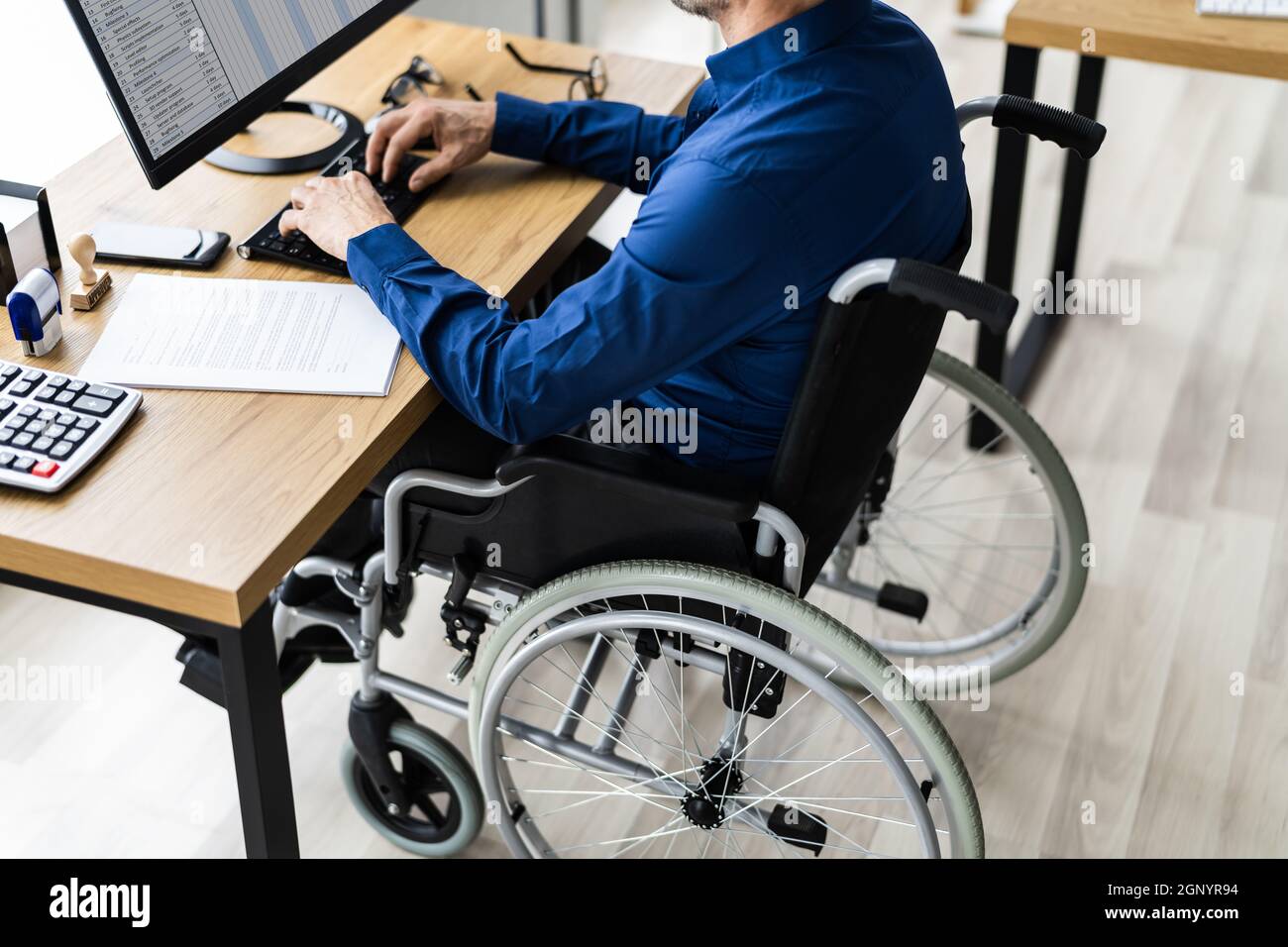 Disabled Handicapped Man In Wheelchair Working Using Computer ...