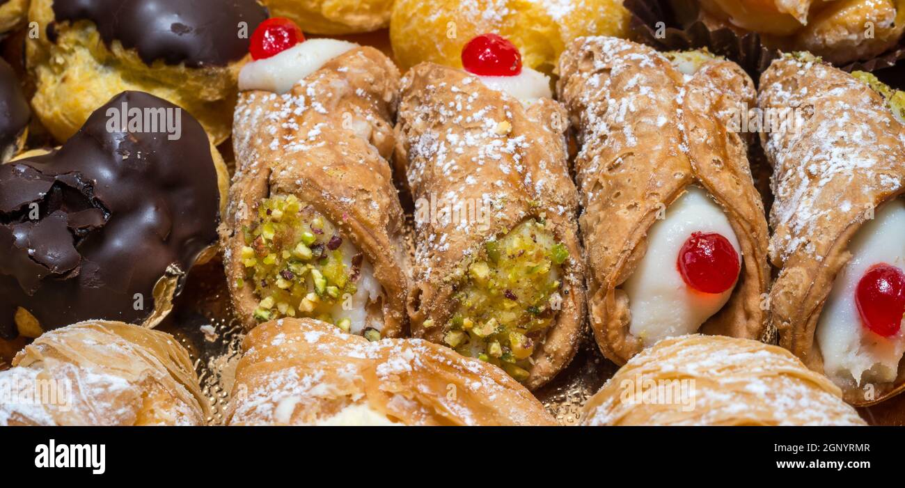 colorful pastries with fruits, cream and chocolate, the real Italian ...