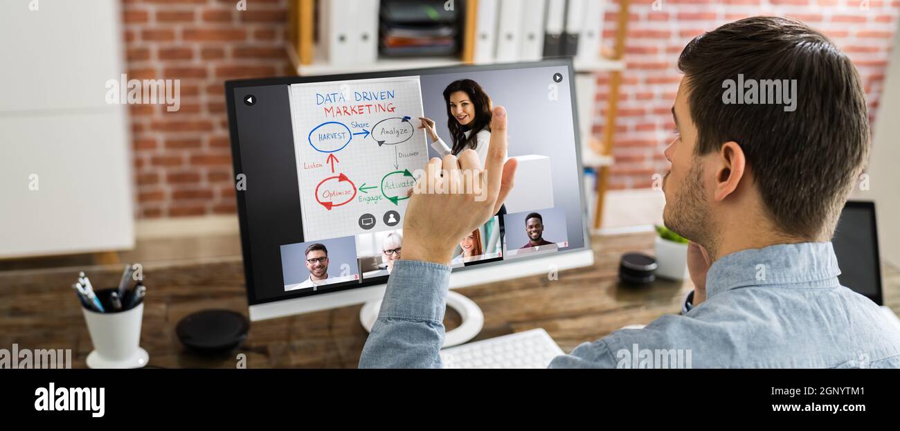 Raising Hand To Ask Questions In Training Video Conference Stock Photo ...