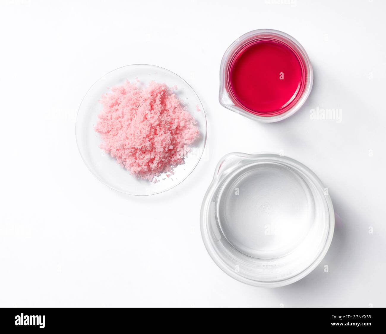Close up inorganic chemical on white laboratory table (Top View). Pink ...
