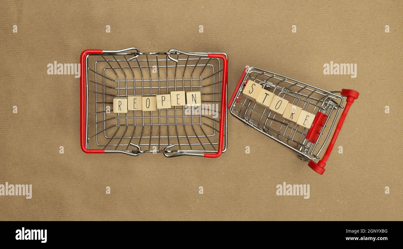 Reopen store concept after the coronavirus pandemic. Wooden blocks with ...