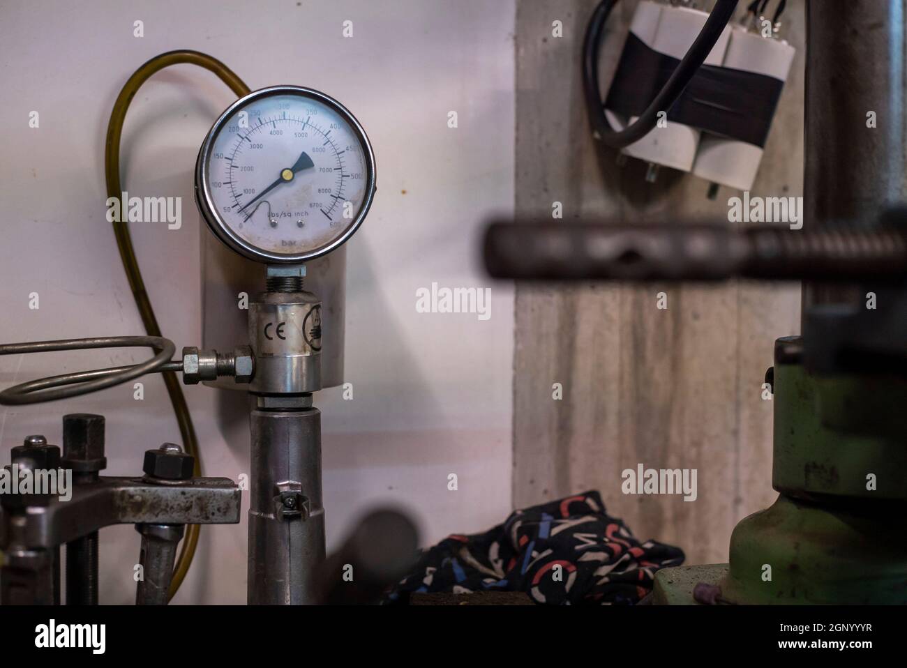 Detail of a pressure gauge inside a Workshop ready for use Stock Photo ...