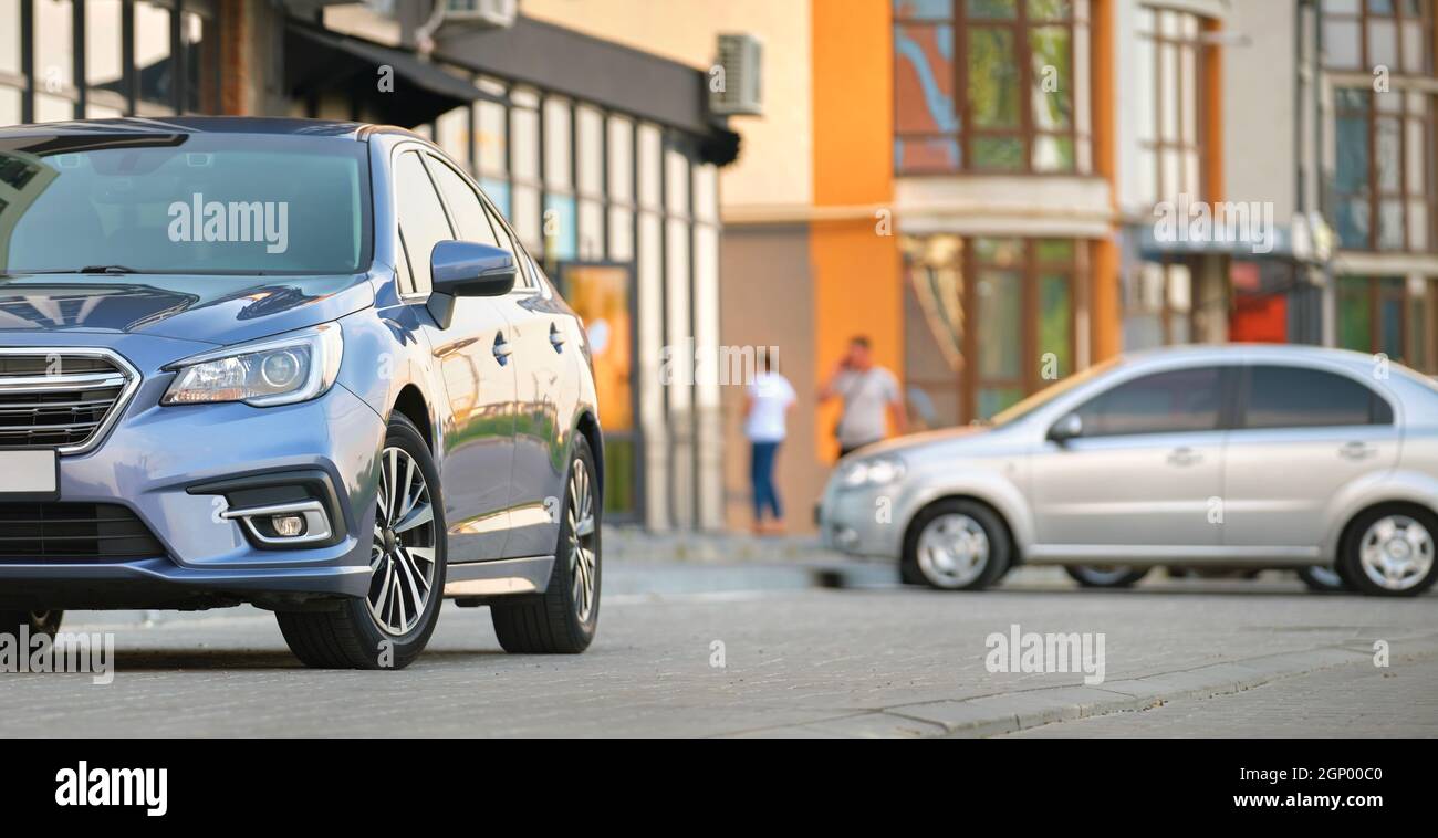 Close up of a car parked illegally against traffic rules on pedestrian ...