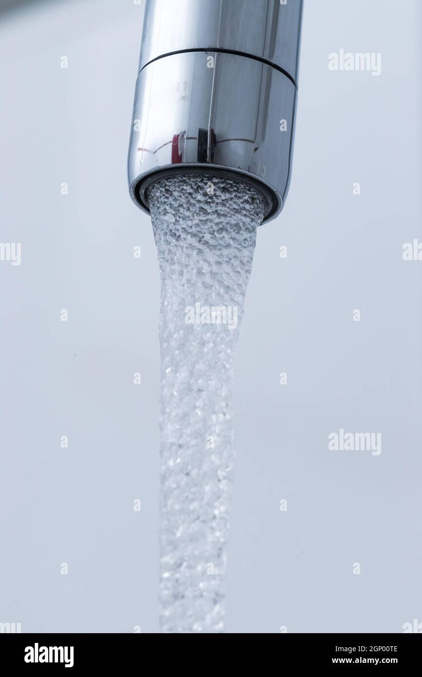 Close up of a water spigot in a clean bathroom. Water saving Stock ...