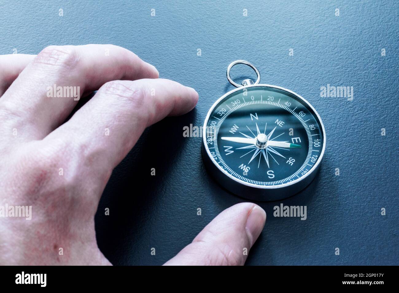 Close up of compass on an office desk, business & innovation Stock ...