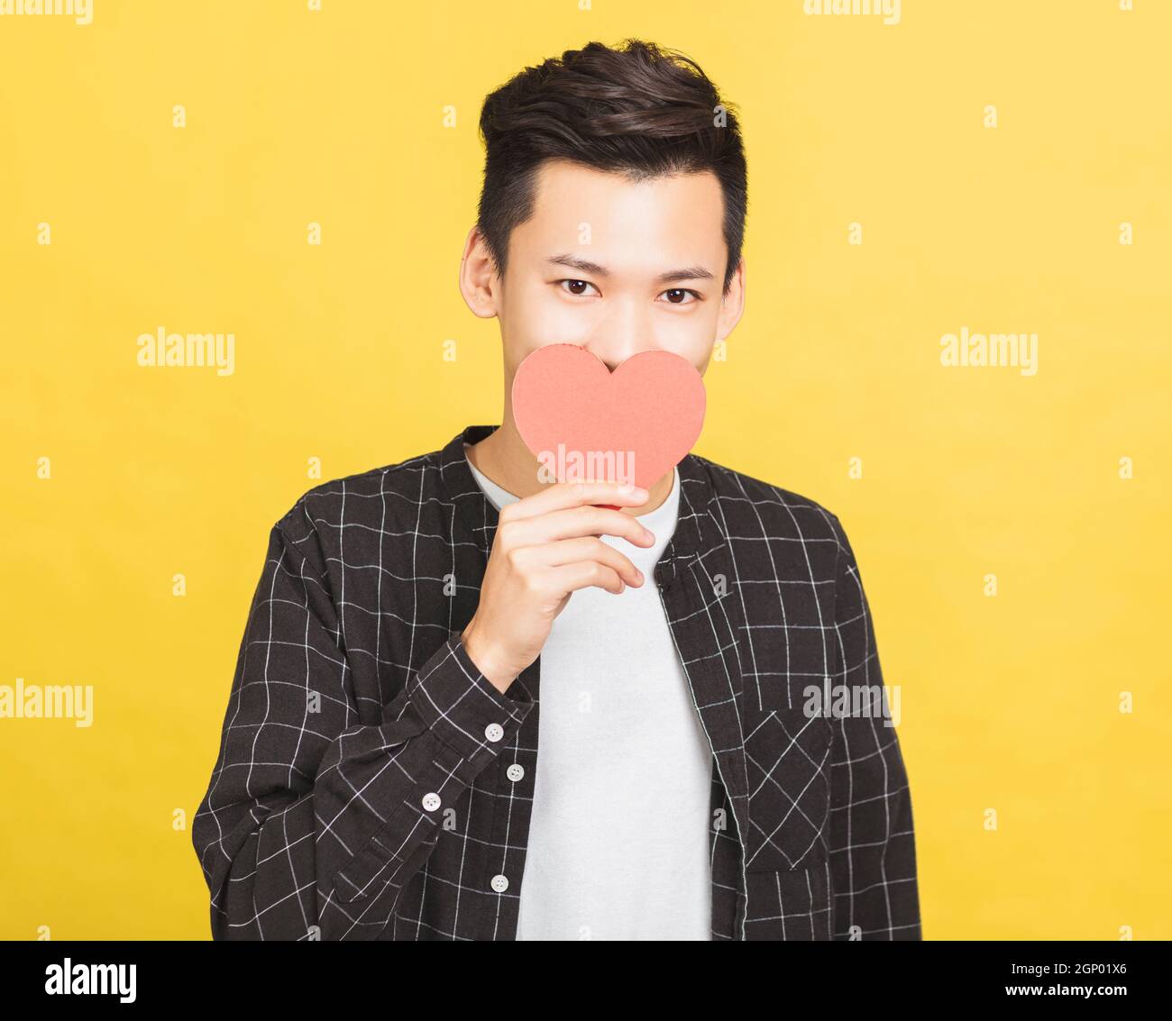 Give heart handsome man hi-res stock photography and images - Alamy