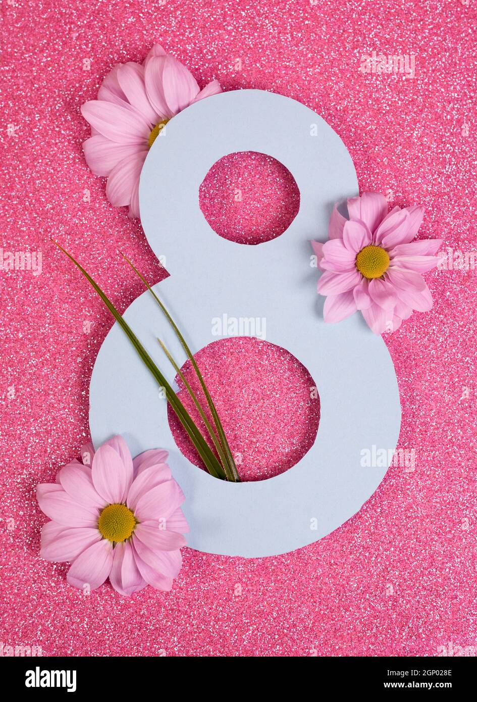 Number Eight cutted in paper against pink glitter background. Good for ...