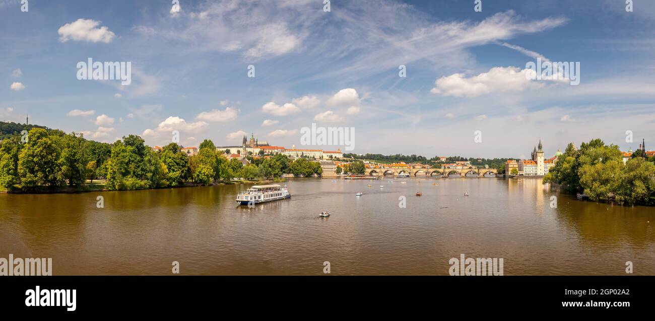 waterfront view across the river Vltava to Prague Castle and Charles ...