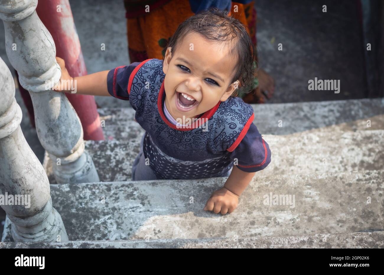 small kid cute smiling face close up shot from top angle Stock Photo ...