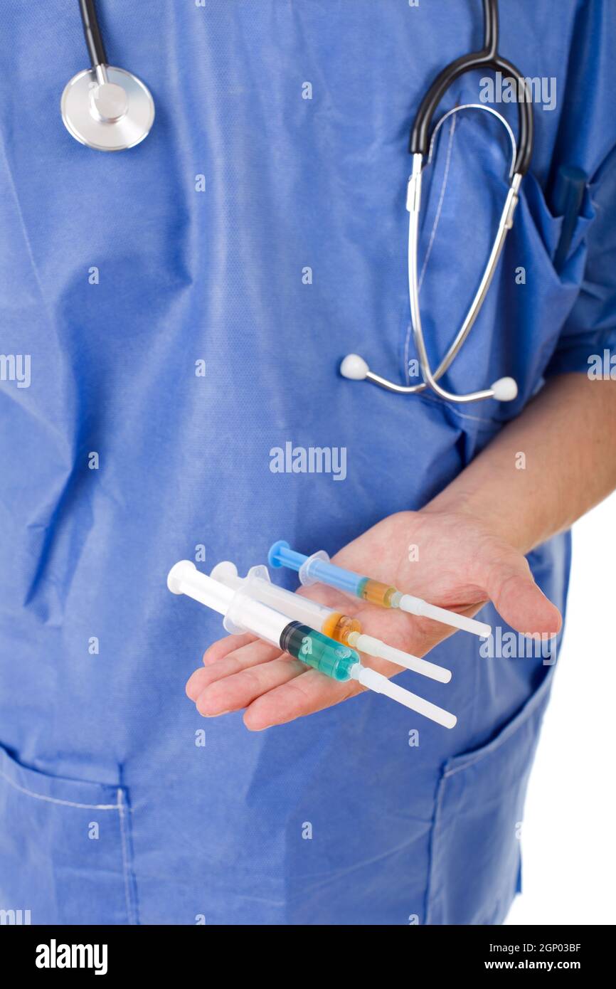 Closeup photo of a male doctor holding syringes Stock Photo - Alamy