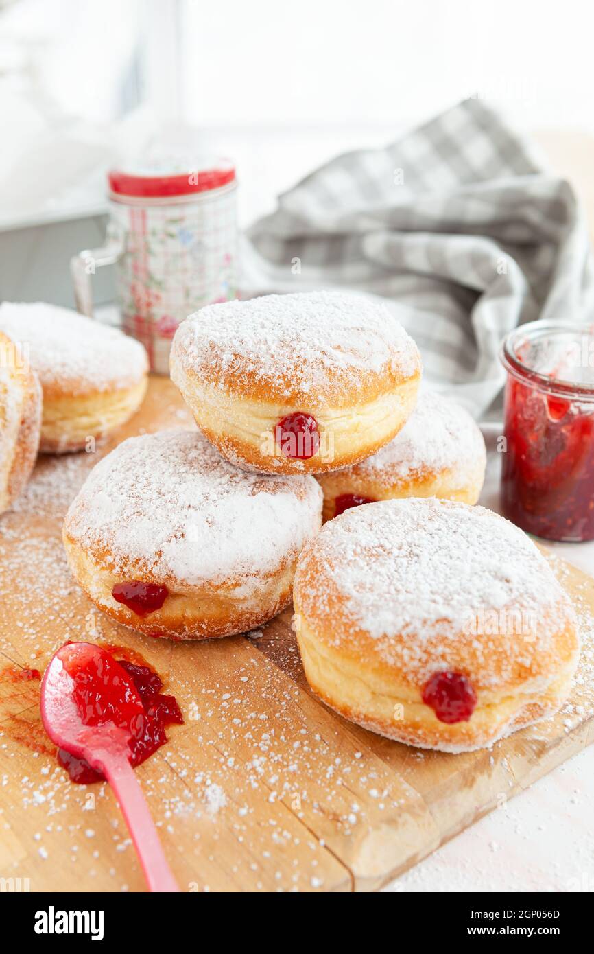 Delicious German donuts filled with jam and powderd sugar Stock Photo ...