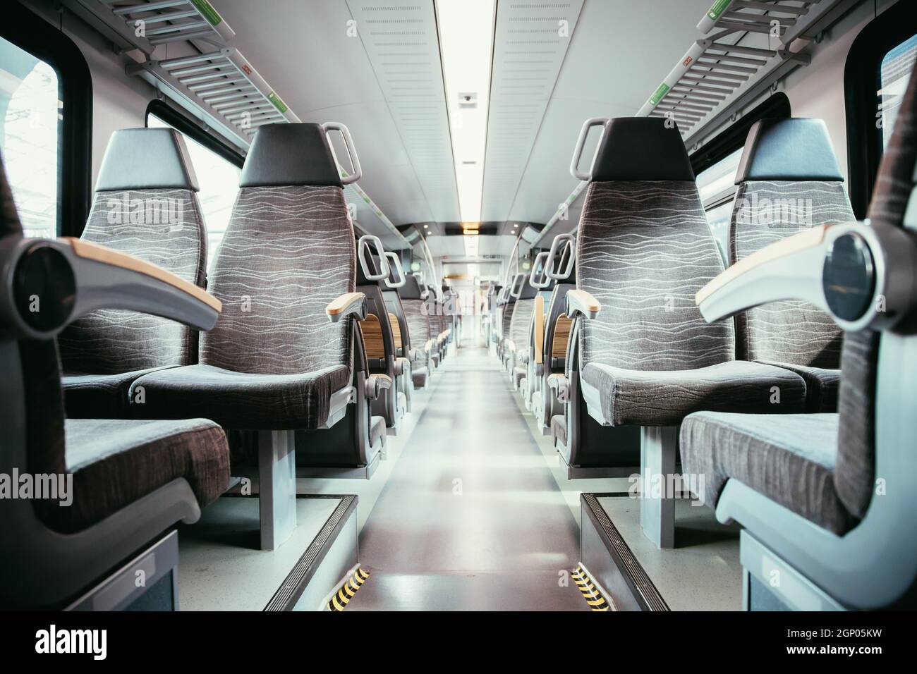 Interior of a public transport train, blurry background Stock Photo - Alamy