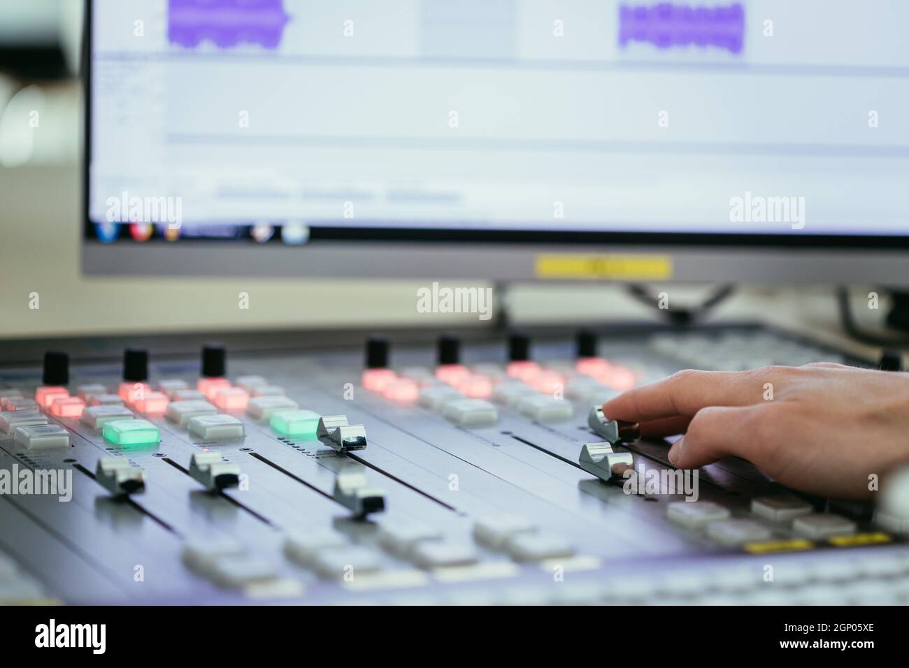 Moderator and soundboard in radio broadcasting studio Stock Photo - Alamy