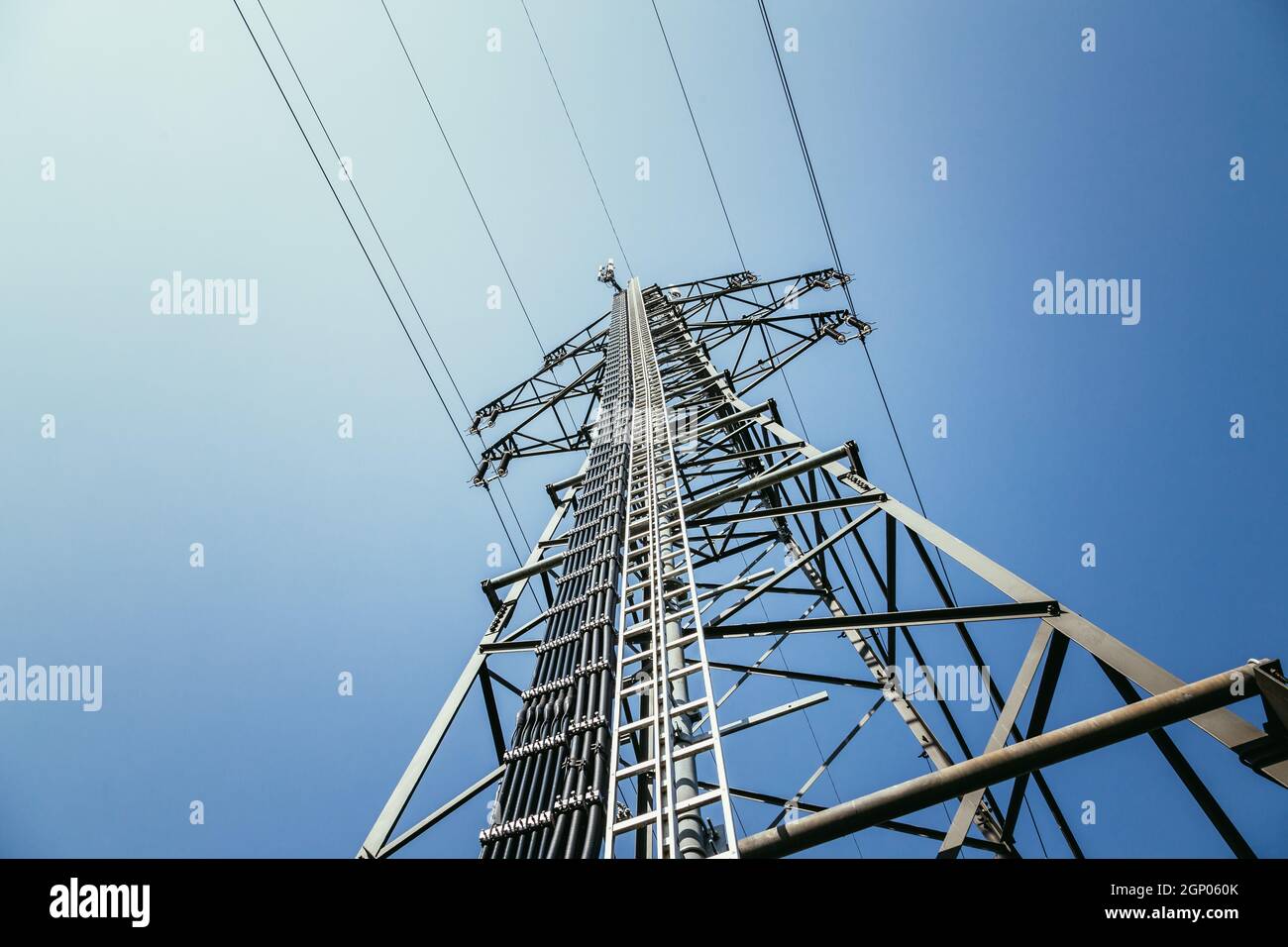 Picture of an electrical tower or pylon, blue sky in the background ...