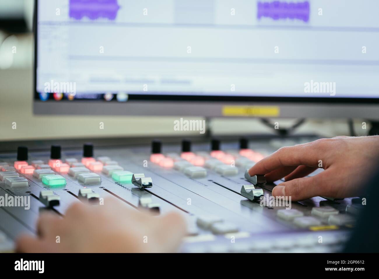 Moderator and soundboard in radio broadcasting studio Stock Photo - Alamy