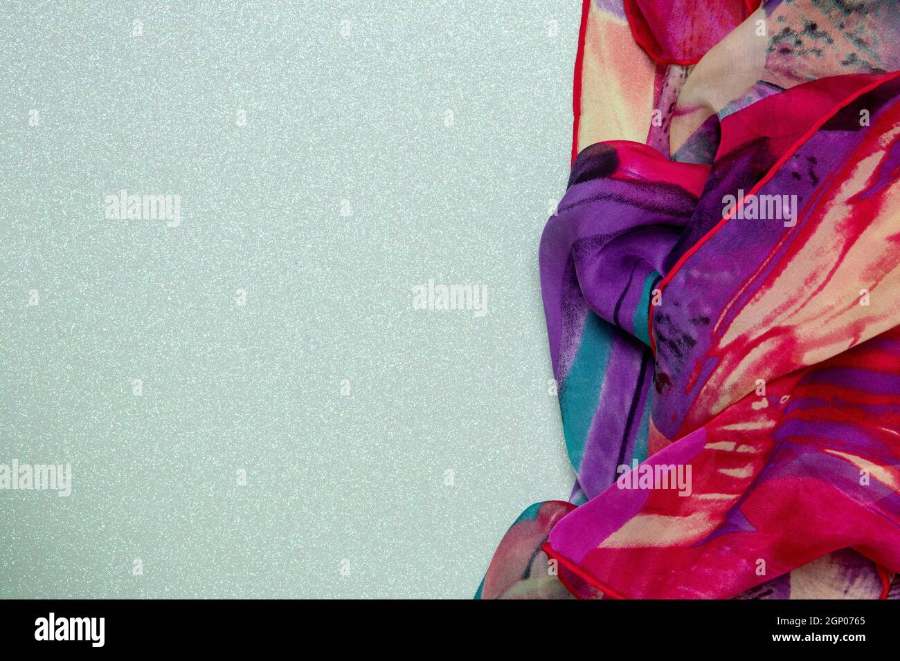 Silk texture background. Closeup of a beautifully wrapped multicolored ...