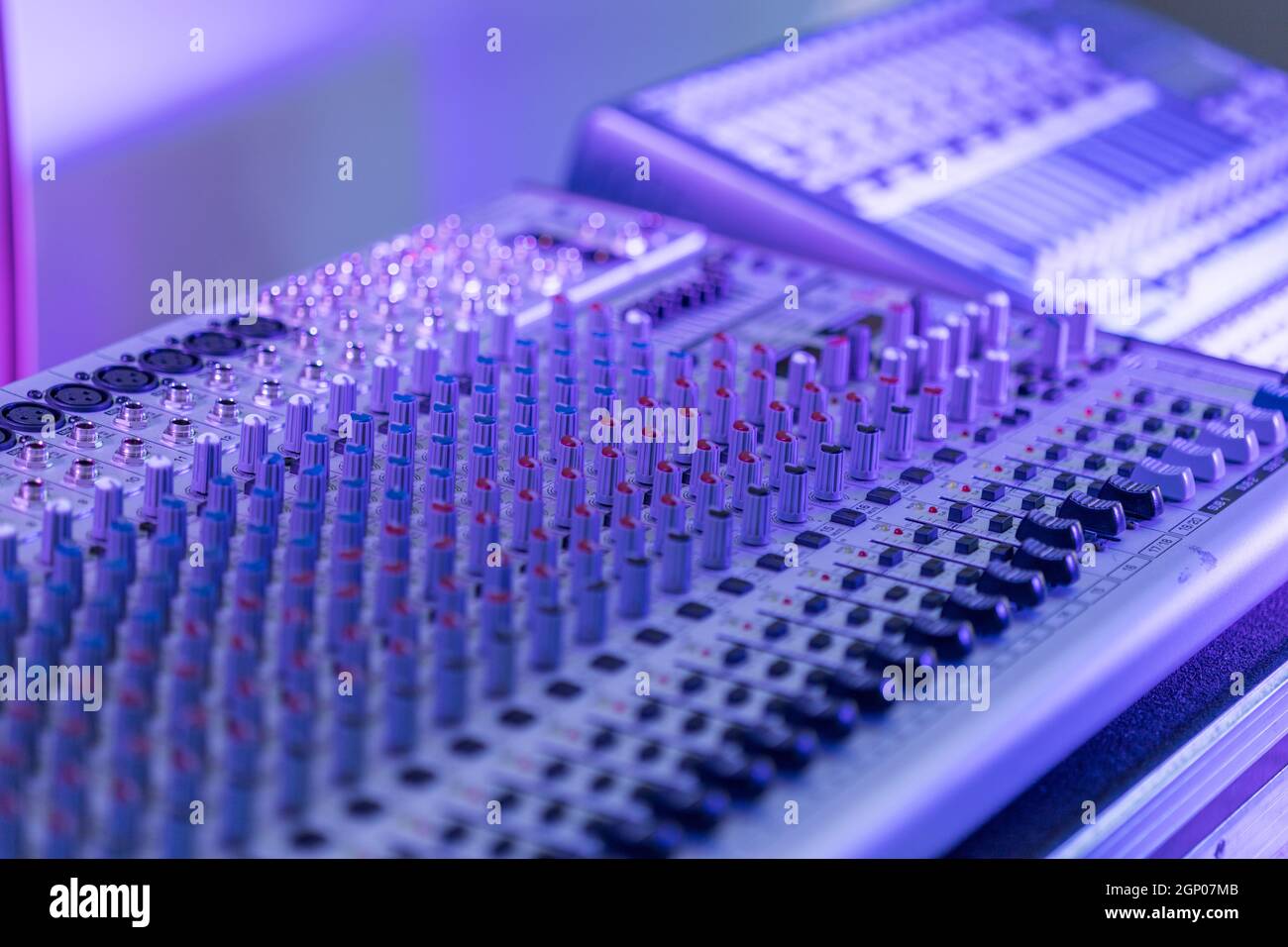 Professional music production in a sound recording studio, mixer desk ...