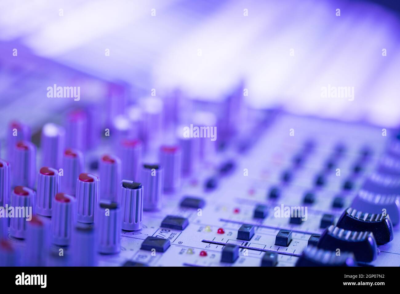 Professional music production in a sound recording studio, mixer desk ...