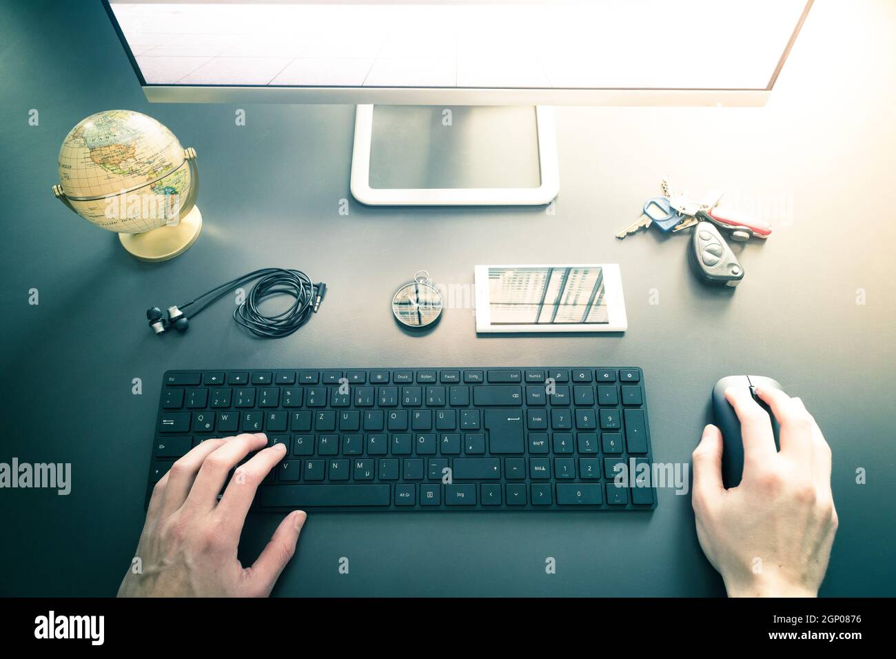 Workplace of a freelancer: Arrangement of computer, keyboard, credit ...