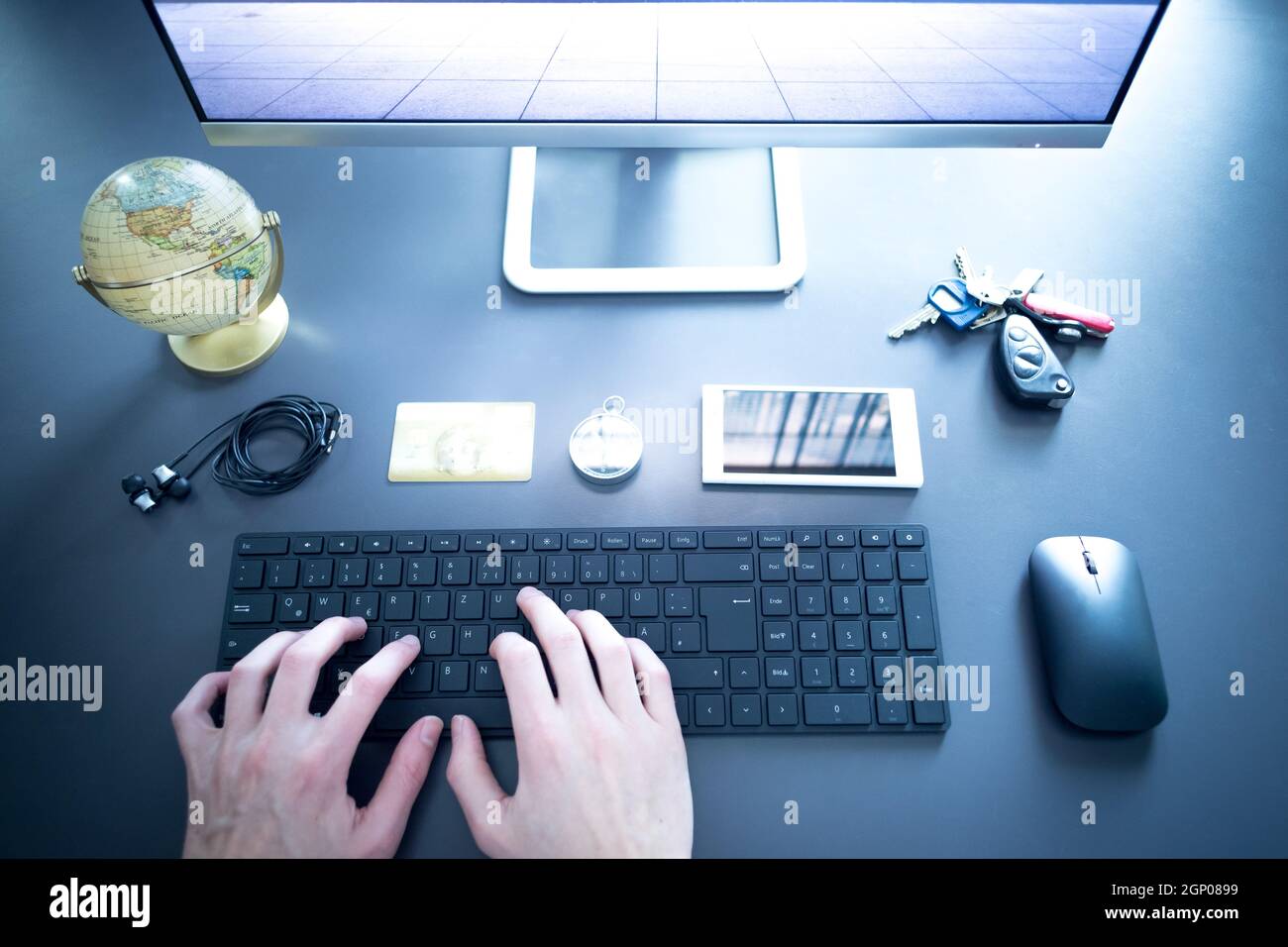 Workplace of a freelancer: Arrangement of computer, keyboard, credit ...