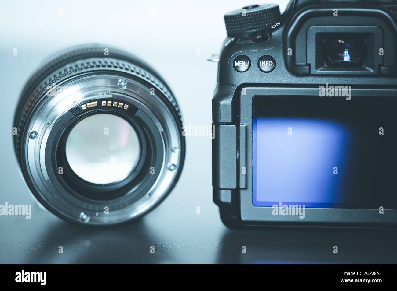 Back view of a professional reflex camera with flip lsd screen and a ...