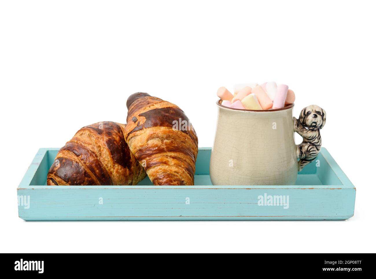 ceramic mug with cocoa and marshmallows, baked croissant on a wooden ...
