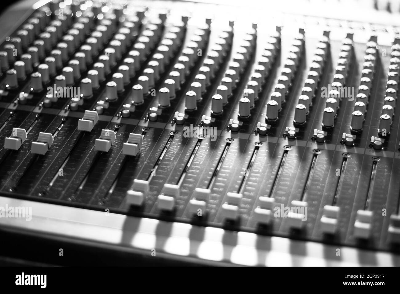 Professional music production in a sound recording studio, mixer desk ...