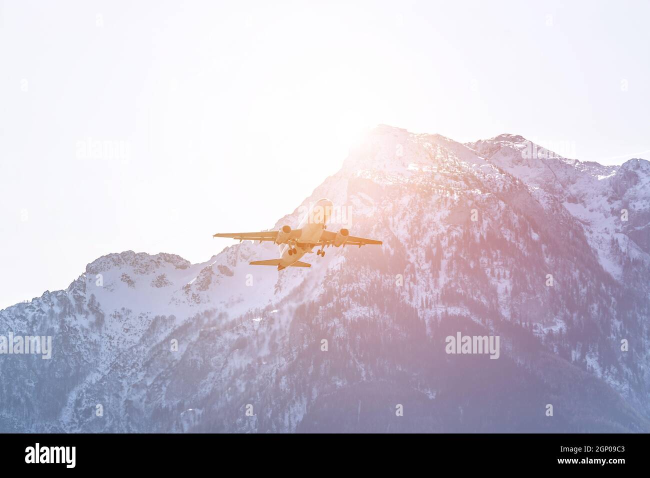 Aircraft is taking off, idyllic mountain range in the background Stock ...