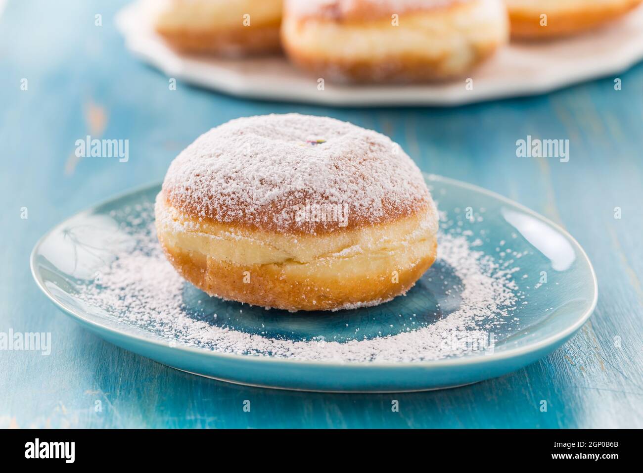 Traditional German Krapfen, Berliner or donuts with icing sugar Stock ...