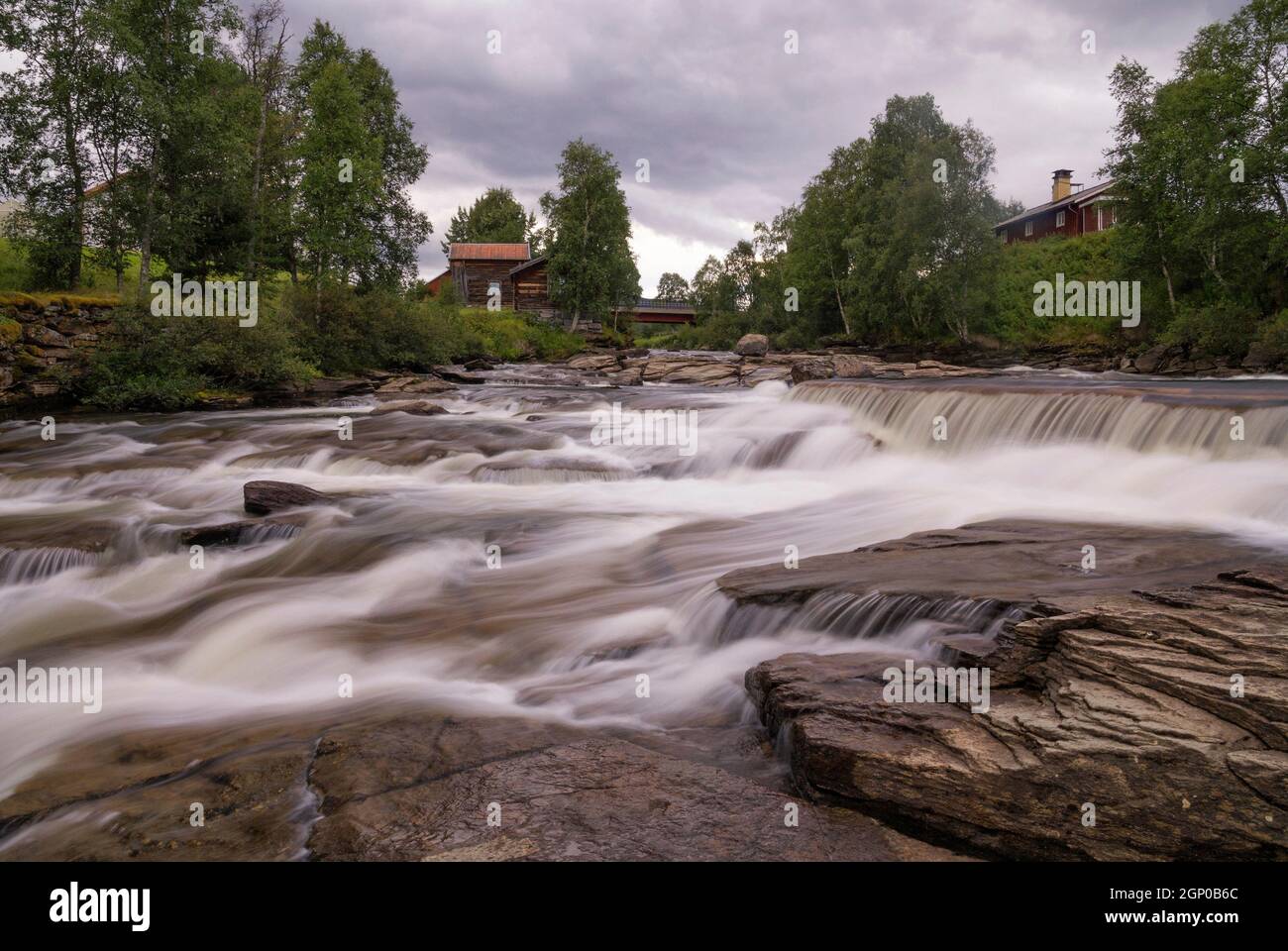 Rapids and waterfalls in the Ljusnan river close to the Swedish village ...