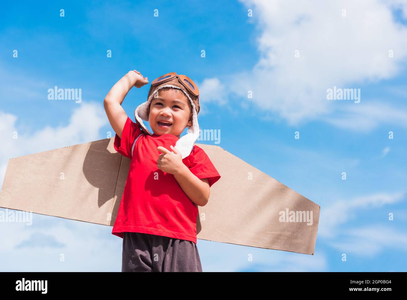 Happy Asian funny child or kid little boy smile wear pilot hat and ...