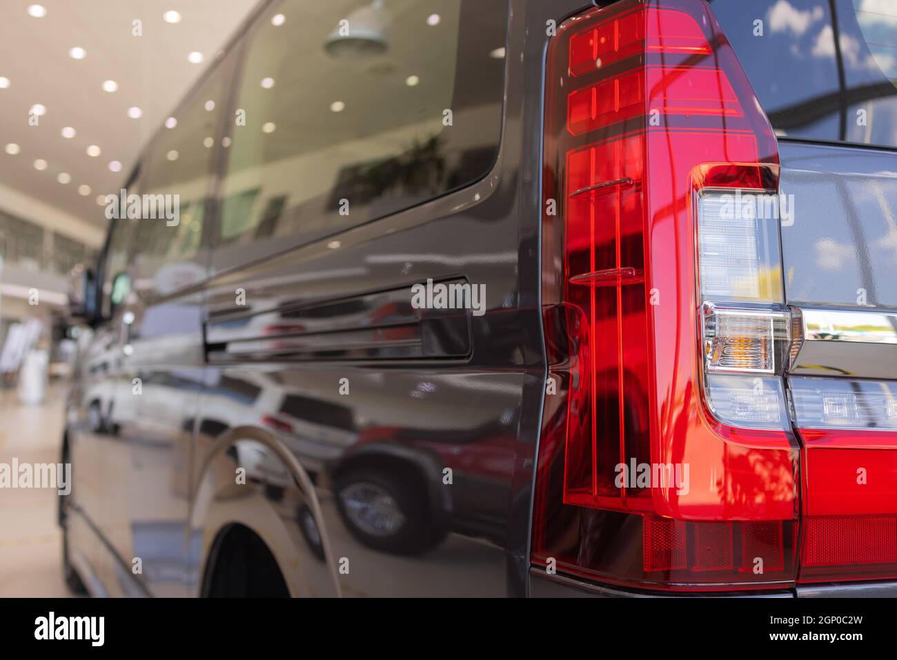 Side view detail of white passenger medium size luxury minibus van ...