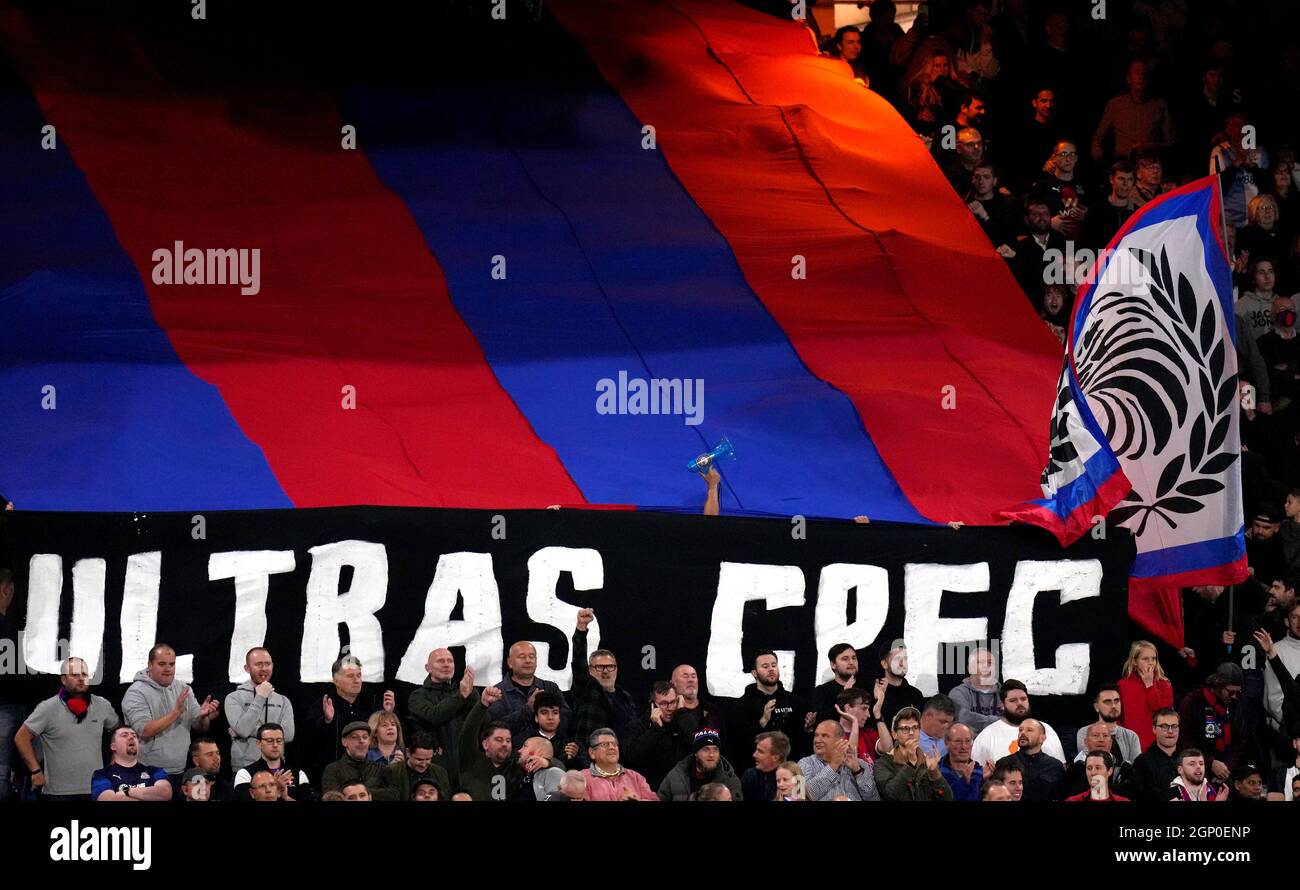 The Crystal Palace Ultras hold up a sign in the stands before the start ...