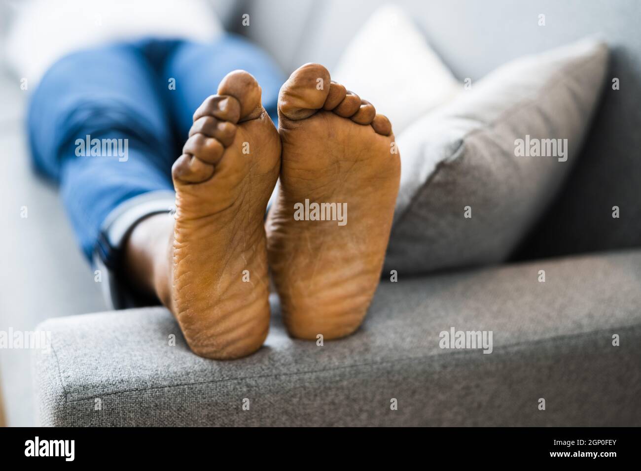 Barefoot African American Man Stinky Barefoot Legs Stock Photo - Alamy