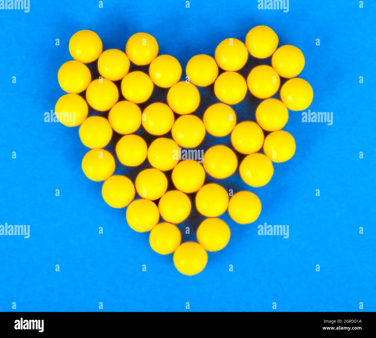 Small medical pharmaceptic round yellow pills, vitamins, drugs ...