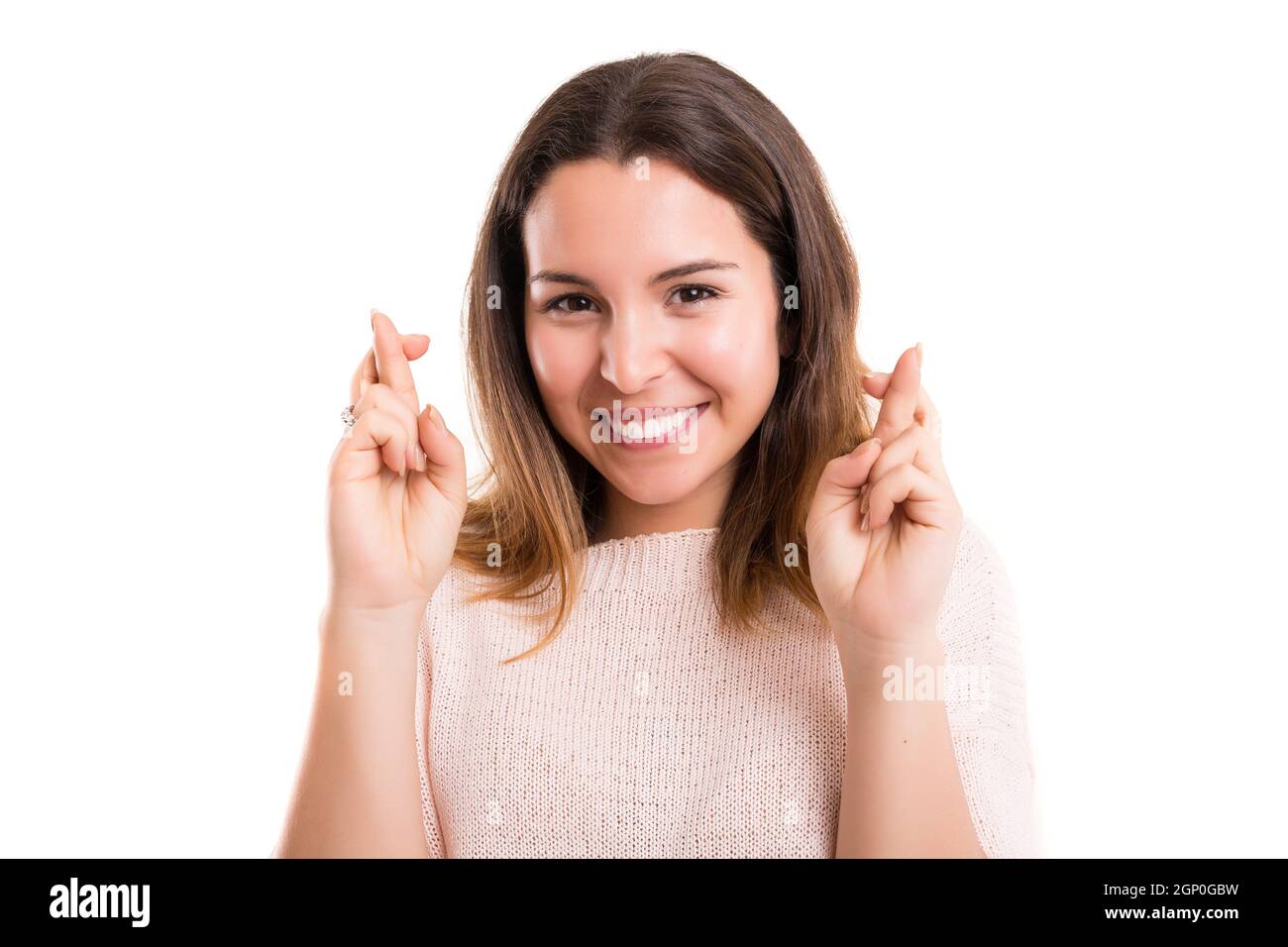 Woman with crossed fingers, isolated over a white background Stock ...