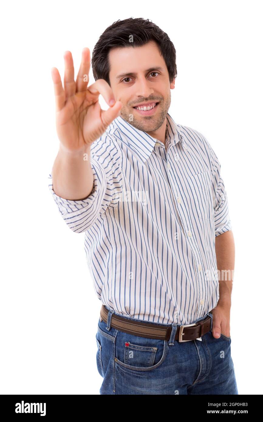 Handsome young man signaling ok, isolated over a white background Stock ...