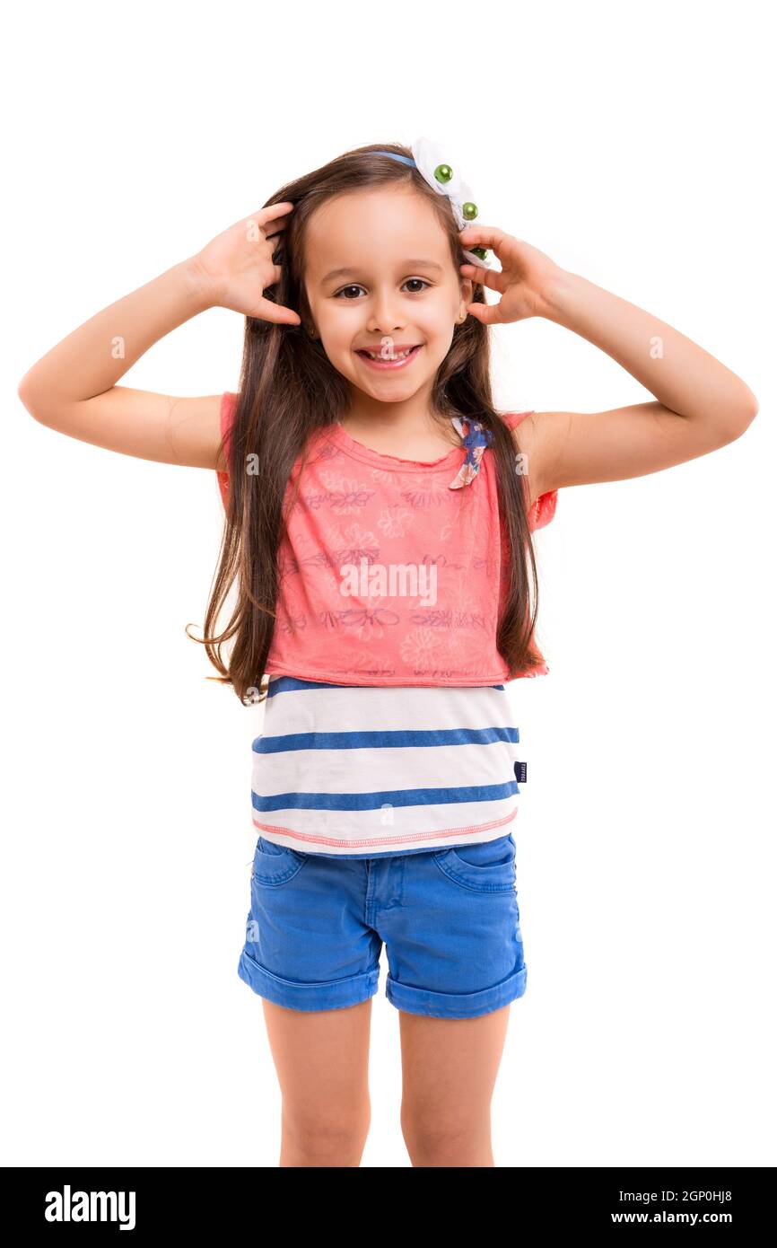 Beautiful young girl posing isolated over white Stock Photo - Alamy