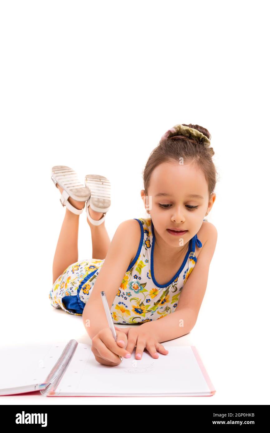 Young girl making some draws - isolated over white Stock Photo - Alamy
