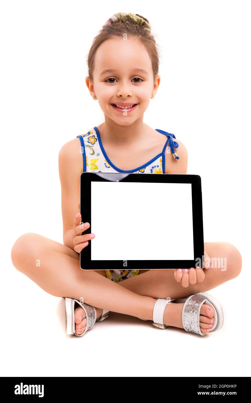 Small girl playing with her new tablet computer Stock Photo - Alamy