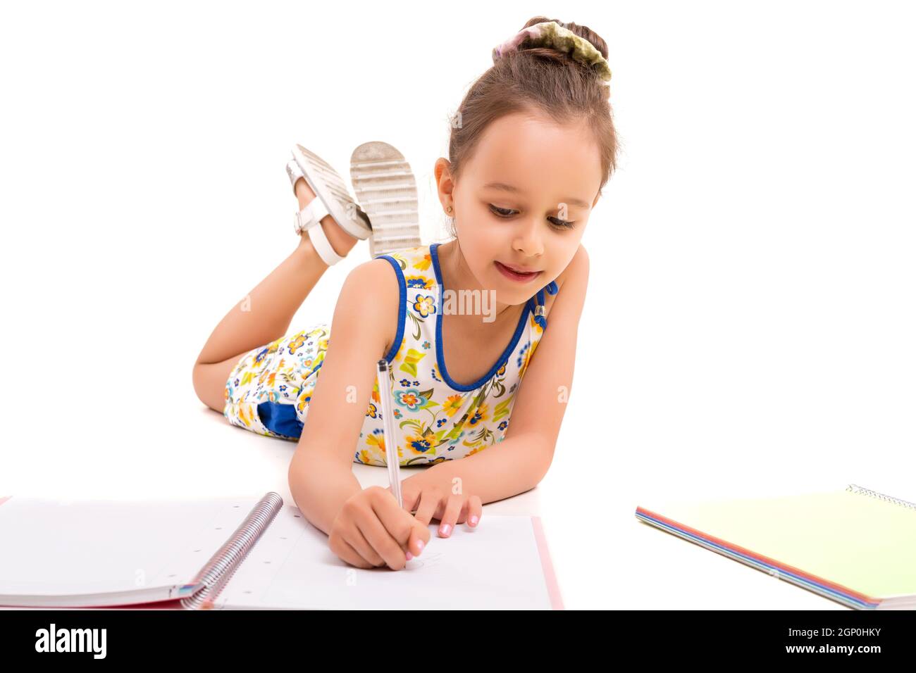 Young girl making some draws - isolated over white Stock Photo - Alamy