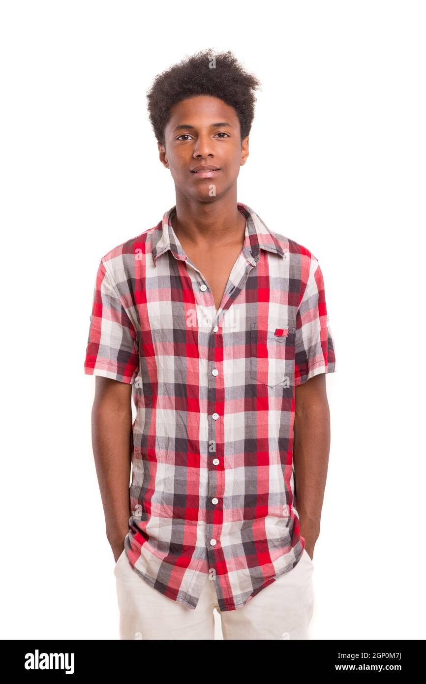 A casual young black boy posing isolated Stock Photo - Alamy